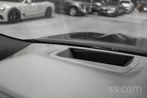 Black BMW X6 2022 in Riga, with an engine capacity of 3.00 L and mileage of 39 thousand km for 66550 €, photo 24 on AUTOMOTO.COM.LV