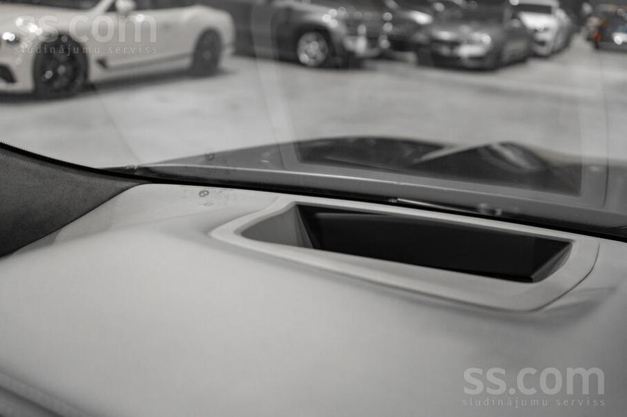 Black BMW X6 2022 in Riga, with an engine capacity of 3.00 L and mileage of 39 thousand km for 66550 €, photo 24 on AUTOMOTO.COM.LV