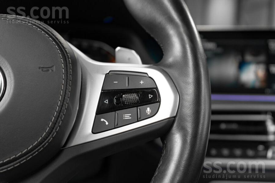 Black BMW X6 2022 in Riga, with an engine capacity of 3.00 L and mileage of 39 thousand km for 66550 €, photo 28 on AUTOMOTO.COM.LV