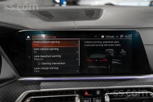 Black BMW X6 2022 in Riga, with an engine capacity of 3.00 L and mileage of 39 thousand km for 66550 €, photo 32 on AUTOMOTO.COM.LV