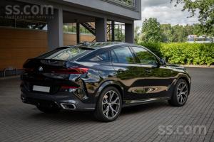 Melns BMW X6 2022 Rīga, ar dzinēja tilpumu 3.00 L un nobraukumu 38 tūkst. km par 59990 €, foto 9 vietnē AUTOMOTO.COM.LV