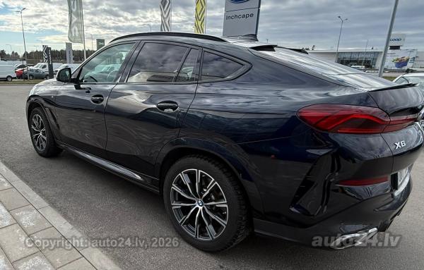 Melns BMW X6 2023 Tallina, ar dzinēja tilpumu 3.00 L un nobraukumu 40 tūkst. km par 75500 €, foto 2 vietnē AUTOMOTO.COM.LV