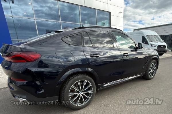 Melns BMW X6 2023 Tallina, ar dzinēja tilpumu 3.00 L un nobraukumu 40 tūkst. km par 75500 €, foto 4 vietnē AUTOMOTO.COM.LV