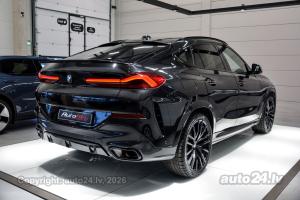 Черный БМВ Х6 2023 в Таллин, объемом двигателя 3.00 л и пробегом 49 тыс. км за 72999 €, фото 6 на AUTOMOTO.COM.LV