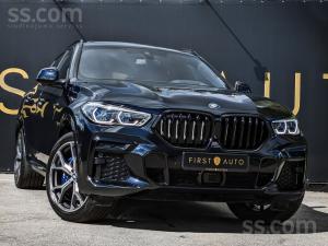 BMW X6 2023 in Tukums on AUTOMOTO.COM.LV Black BMW X6 2023 in Tukums, with an engine capacity of 3.00 L and mileage of 64 thousand km for 59990 €, photo 1 on AUTOMOTO.COM.LV