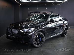 Black BMW X6 2023 in Tallinn, with an engine capacity of 3.00 L and mileage of 31 thousand km for 69900 €, photo  on AUTOMOTO.COM.LV