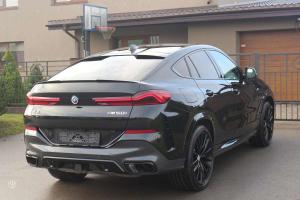 Black BMW X6 2023 in Vilnius, with an engine capacity of 4.40 L and mileage of 27 thousand km for 67000 €, photo 6 on AUTOMOTO.COM.LV