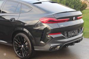 Black BMW X6 2023 in Vilnius, with an engine capacity of 4.40 L and mileage of 27 thousand km for 67000 €, photo 7 on AUTOMOTO.COM.LV