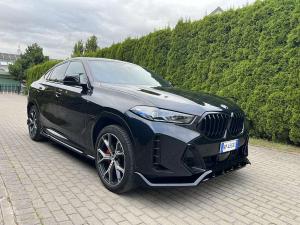 Black BMW X6 2023 in Vilnius, with an engine capacity of 3.00 L and mileage of 151 thousand km for 65000 €, photo  on AUTOMOTO.COM.LV