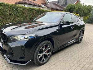 Black BMW X6 2023 in Vilnius, with an engine capacity of 3.00 L and mileage of 151 thousand km for 65000 €, photo 17 on AUTOMOTO.COM.LV