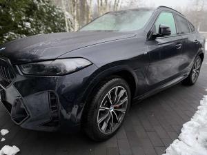 Black BMW X6 2024 in Kaunas, with an engine capacity of 2.99 L and mileage of 24 thousand km for 93500 €, photo 2 on AUTOMOTO.COM.LV