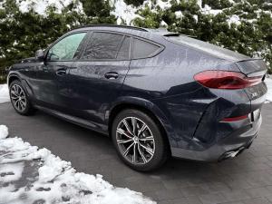 Black BMW X6 2024 in Kaunas, with an engine capacity of 2.99 L and mileage of 24 thousand km for 93500 €, photo 4 on AUTOMOTO.COM.LV
