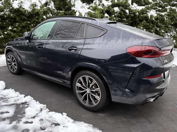 Black BMW X6 2024 in Kaunas, with an engine capacity of 2.99 L and mileage of 24 thousand km for 93500 €, photo 8 on AUTOMOTO.COM.LV