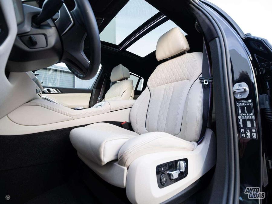 Black BMW X6 2024 in Marijampole, with an engine capacity of 3.00 L and mileage of 28 thousand km for 79950 €, photo 25 on AUTOMOTO.COM.LV