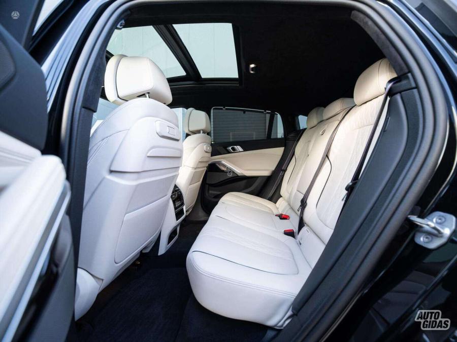 Black BMW X6 2024 in Marijampole, with an engine capacity of 3.00 L and mileage of 28 thousand km for 79950 €, photo 35 on AUTOMOTO.COM.LV