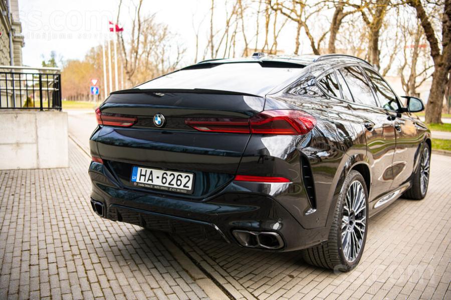 Black BMW X6 2024 in Liepaja, with an engine capacity of 3.00 L and mileage of 33 thousand km for 86900 €, photo 6 on AUTOMOTO.COM.LV