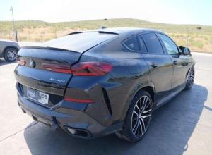 Black BMW X6 2024 in Klaipeda, with an engine capacity of 2.99 L and mileage of 36 thousand km for 19500 €, photo 5 on AUTOMOTO.COM.LV