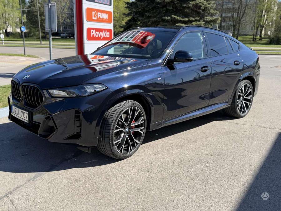 Black BMW X6 2024 in Kazlu Ruda, with an engine capacity of 3.00 L and mileage of 31 thousand km for 89500 €, photo 1 on AUTOMOTO.COM.LV