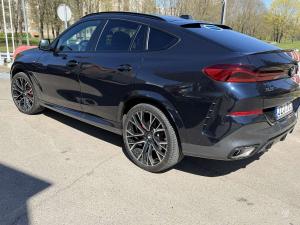 Black BMW X6 2024 in Kazlu Ruda, with an engine capacity of 3.00 L and mileage of 31 thousand km for 89500 €, photo 3 on AUTOMOTO.COM.LV