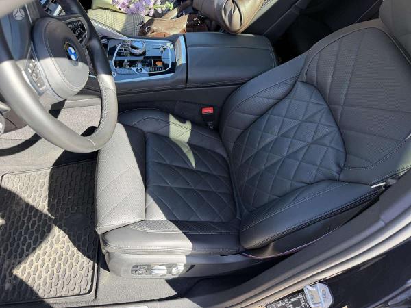 Black BMW X6 2024 in Kazlu Ruda, with an engine capacity of 3.00 L and mileage of 31 thousand km for 89500 €, photo 3 on AUTOMOTO.COM.LV