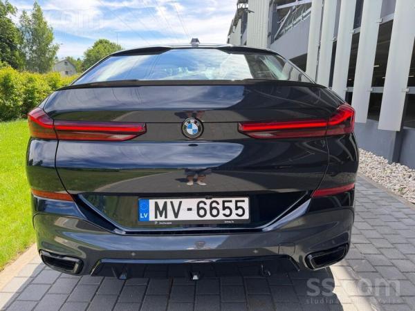 Melns BMW X6 2024 Rīga, ar dzinēja tilpumu 3.00 L un nobraukumu 62 tūkst. km par 65900 €, foto 2 vietnē AUTOMOTO.COM.LV
