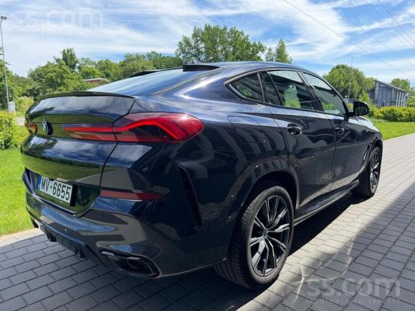 Melns BMW X6 2024 Rīga, ar dzinēja tilpumu 3.00 L un nobraukumu 62 tūkst. km par 65900 €, foto 4 vietnē AUTOMOTO.COM.LV