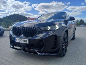 Black BMW X6 2024 in Vilnius, with an engine capacity of 2.99 L and mileage of 66 thousand km for 81615 €, photo  on AUTOMOTO.COM.LV