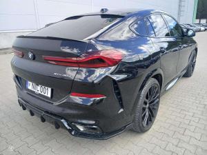 Black BMW X6 2024 in Vilnius, with an engine capacity of 2.99 L and mileage of 66 thousand km for 81615 €, photo 5 on AUTOMOTO.COM.LV