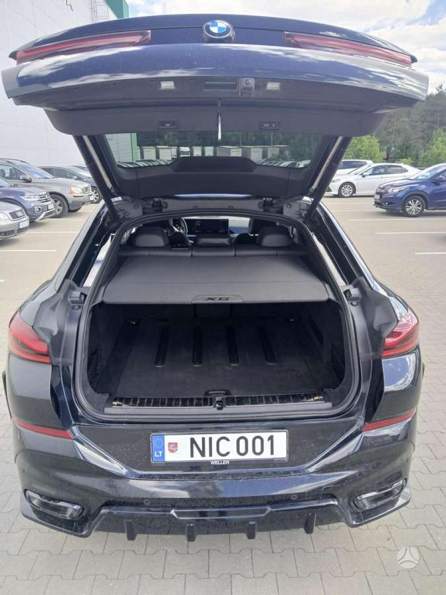 Black BMW X6 2024 in Vilnius, with an engine capacity of 2.99 L and mileage of 66 thousand km for 81615 €, photo 6 on AUTOMOTO.COM.LV