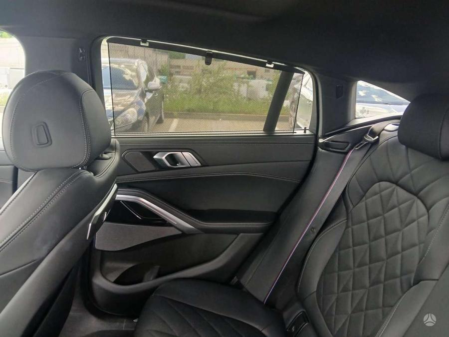 Black BMW X6 2024 in Vilnius, with an engine capacity of 2.99 L and mileage of 66 thousand km for 81615 €, photo 9 on AUTOMOTO.COM.LV