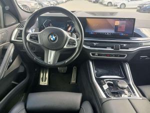Black BMW X6 2024 in Vilnius, with an engine capacity of 2.99 L and mileage of 66 thousand km for 81615 €, photo 15 on AUTOMOTO.COM.LV