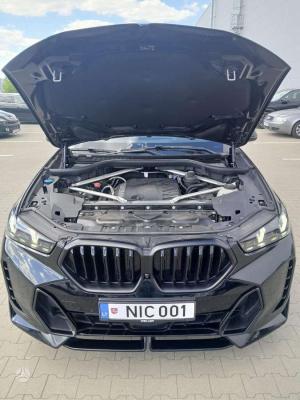 Black BMW X6 2024 in Vilnius, with an engine capacity of 2.99 L and mileage of 66 thousand km for 81615 €, photo 19 on AUTOMOTO.COM.LV