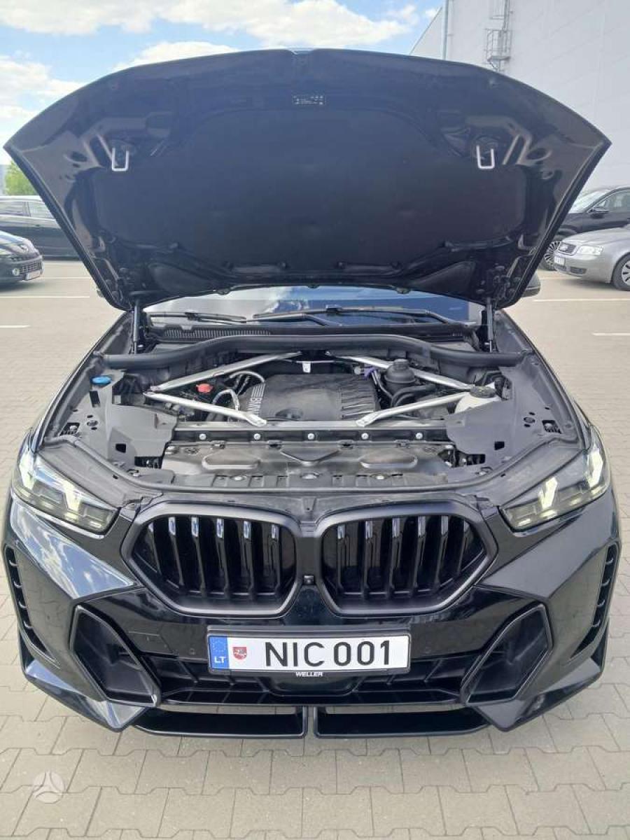 Black BMW X6 2024 in Vilnius, with an engine capacity of 2.99 L and mileage of 66 thousand km for 81615 €, photo 19 on AUTOMOTO.COM.LV