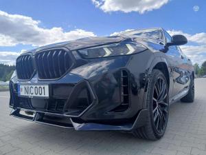Black BMW X6 2024 in Vilnius, with an engine capacity of 2.99 L and mileage of 66 thousand km for 81615 €, photo 21 on AUTOMOTO.COM.LV