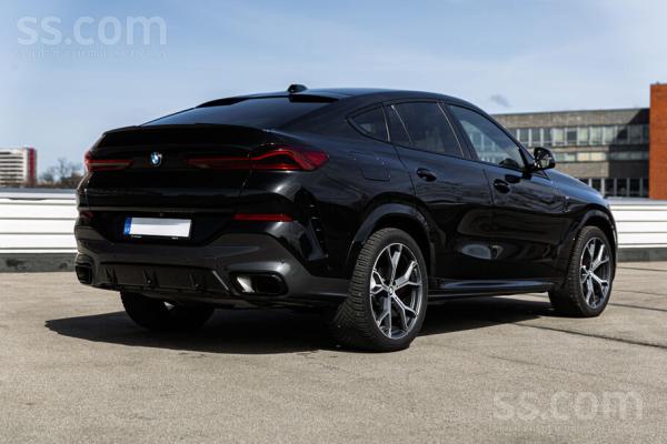 Black BMW X6 2025 in Riga, with an engine capacity of 3.00 L and mileage of 19 thousand km for 87000 €, photo 4 on AUTOMOTO.COM.LV