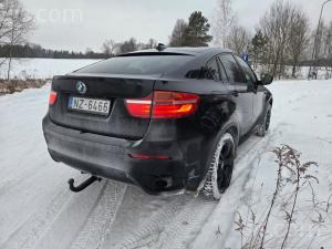 Black BMW X6 2012 in Riga, with an engine capacity of 3.00 L and mileage of 265 thousand km for 16500 €, photo 3 on AUTOMOTO.COM.LV