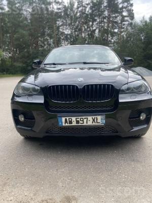 Melns BMW X6 2012 Rīga, ar dzinēja tilpumu 3.00 L un nobraukumu 300 tūkst. km par 13900 €, foto  vietnē AUTOMOTO.COM.LV