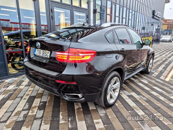 Black BMW X6 2013 in Tallinn, with an engine capacity of 3.00 L and mileage of 202 thousand km for 15990 €, photo 6 on AUTOMOTO.COM.LV