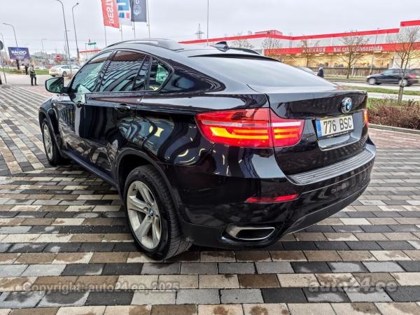 Black BMW X6 2013 in Tallinn, with an engine capacity of 3.00 L and mileage of 202 thousand km for 15990 €, photo 7 on AUTOMOTO.COM.LV