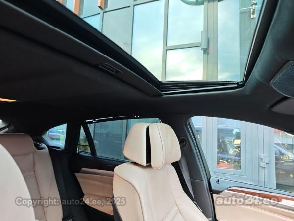 Black BMW X6 2013 in Tallinn, with an engine capacity of 3.00 L and mileage of 202 thousand km for 15990 €, photo 9 on AUTOMOTO.COM.LV