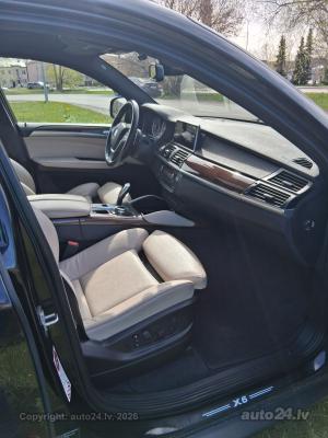 Black BMW X6 2013 in Tallinn, with an engine capacity of 3.00 L and mileage of 205 thousand km for 15990 €, photo 19 on AUTOMOTO.COM.LV