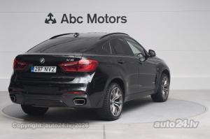 Black BMW X6 2018 in Tallinn, with an engine capacity of 3.00 L and mileage of 168 thousand km for 29900 €, photo 4 on AUTOMOTO.COM.LV
