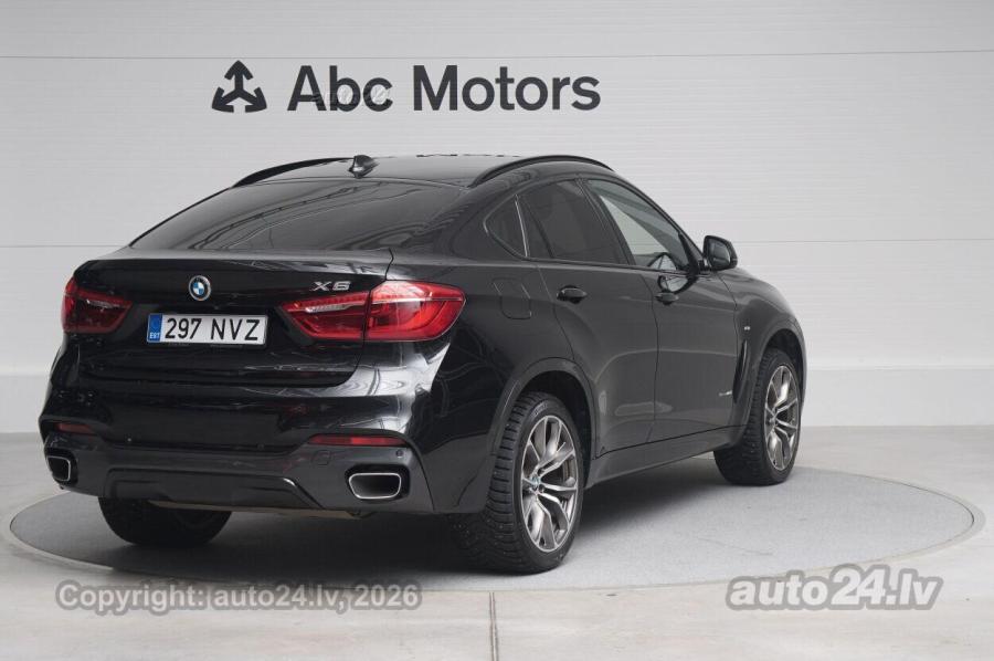 Black BMW X6 2018 in Tallinn, with an engine capacity of 3.00 L and mileage of 168 thousand km for 29900 €, photo 4 on AUTOMOTO.COM.LV