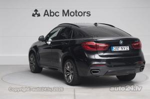Black BMW X6 2018 in Tallinn, with an engine capacity of 3.00 L and mileage of 168 thousand km for 29900 €, photo 6 on AUTOMOTO.COM.LV