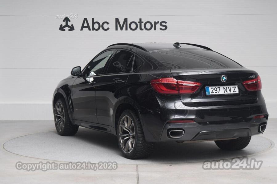 Black BMW X6 2018 in Tallinn, with an engine capacity of 3.00 L and mileage of 168 thousand km for 29900 €, photo 6 on AUTOMOTO.COM.LV
