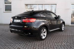 Black BMW X6 2010 in Tartu, with an engine capacity of 3.00 L and mileage of 279 thousand km for 9990 €, photo 4 on AUTOMOTO.COM.LV