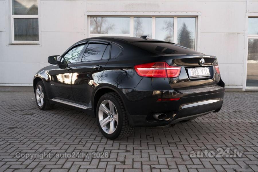 Black BMW X6 2010 in Tartu, with an engine capacity of 3.00 L and mileage of 279 thousand km for 9990 €, photo 6 on AUTOMOTO.COM.LV