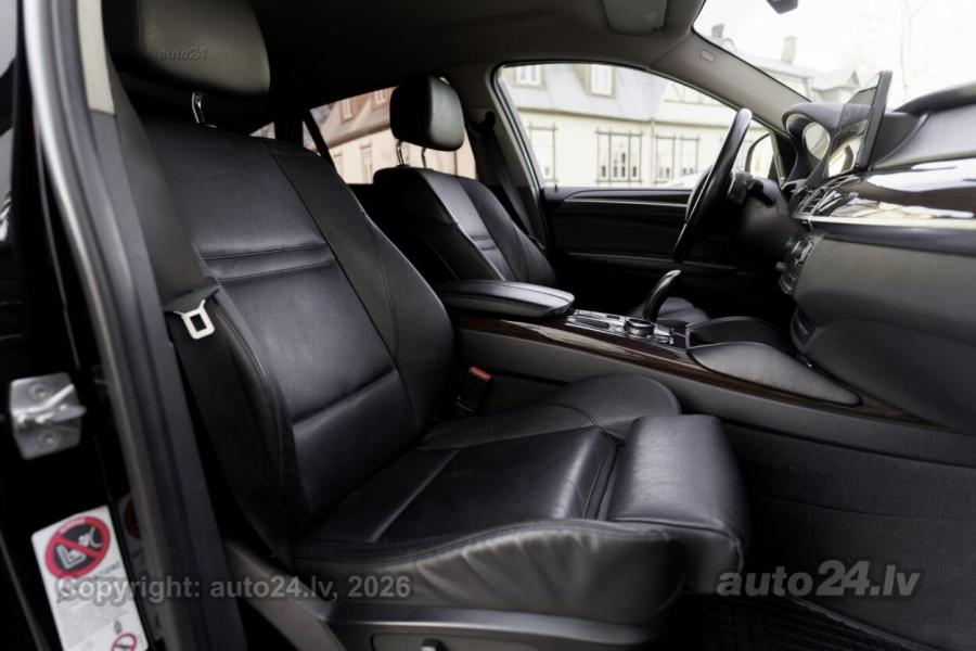 Black BMW X6 2010 in Tartu, with an engine capacity of 3.00 L and mileage of 279 thousand km for 9990 €, photo 10 on AUTOMOTO.COM.LV