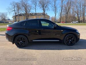 Black BMW X6 2011 in Narva, with an engine capacity of 3.00 L and mileage of 0 thousand km for 12999 €, photo 3 on AUTOMOTO.COM.LV