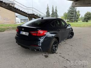Blue BMW X6 2016 in Rezekne, with an engine capacity of 3.00 L and mileage of 231 thousand km for 22800 €, photo 5 on AUTOMOTO.COM.LV